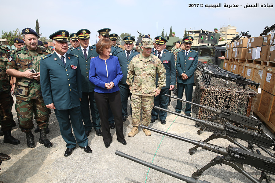 The handover ceremony of medium caliber weapons offered by the US ...